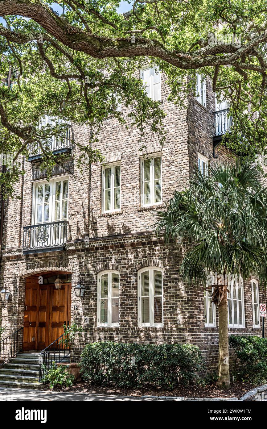 A historic stone building in Charleston, South Carolina surrounded by ...