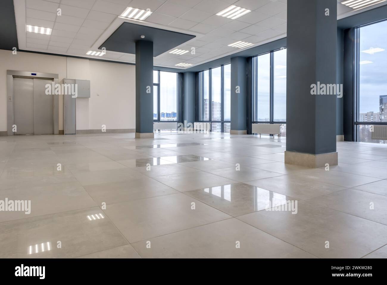 panorama view in empty modern hall with columns, doors , stairs and ...