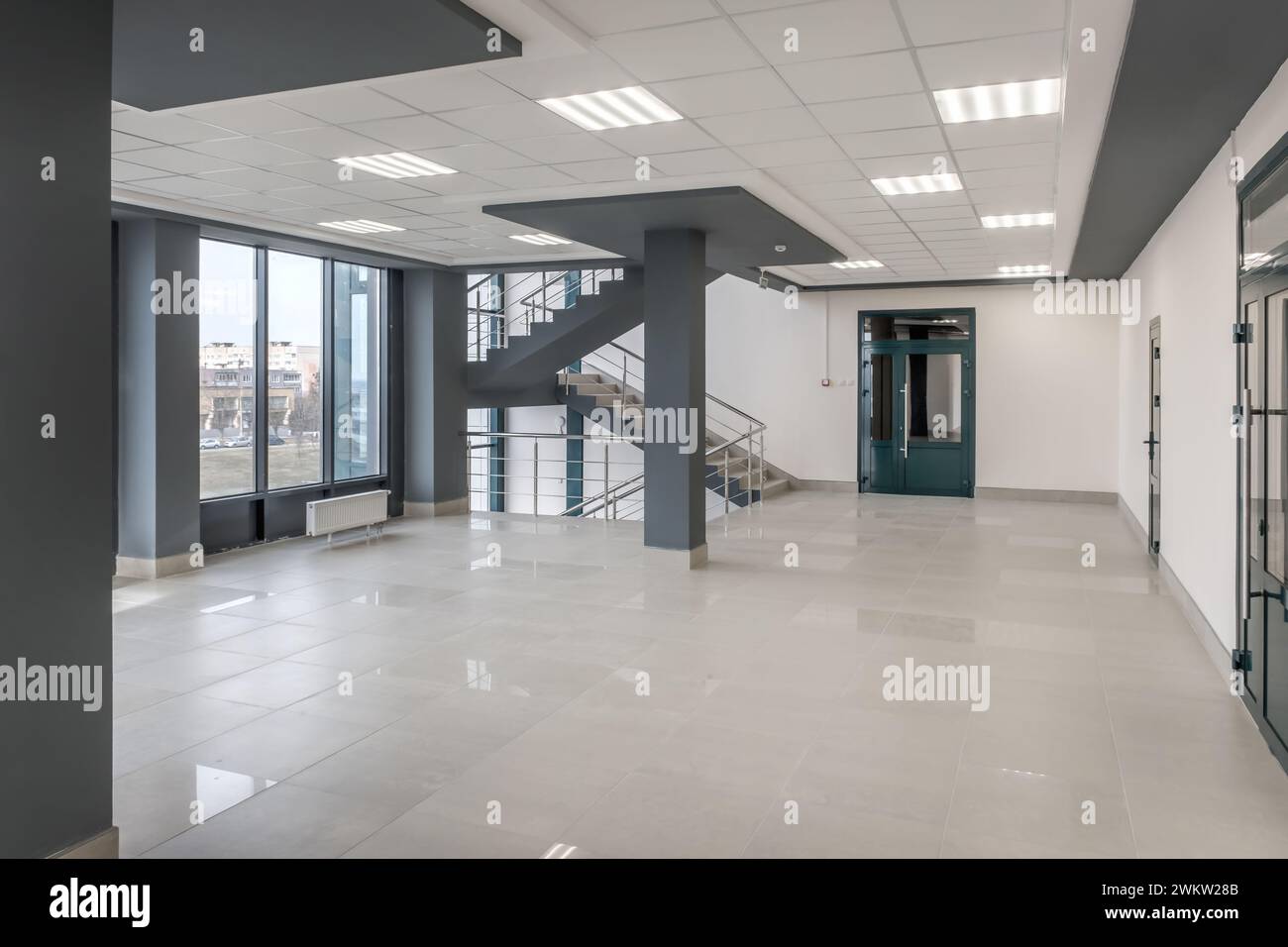 panorama view in empty modern hall with columns, doors , stairs and ...