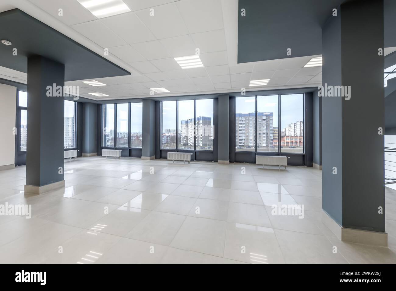 panorama view in empty modern hall with columns, doors , stairs and ...
