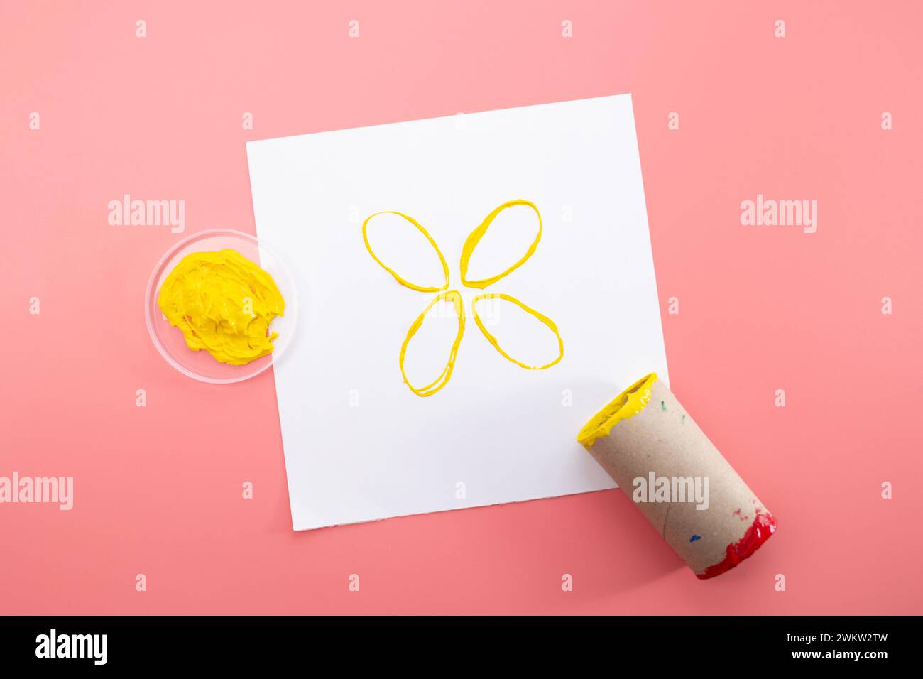 making paper craft butterflies, stamp, paint tubes, recycling concept ...