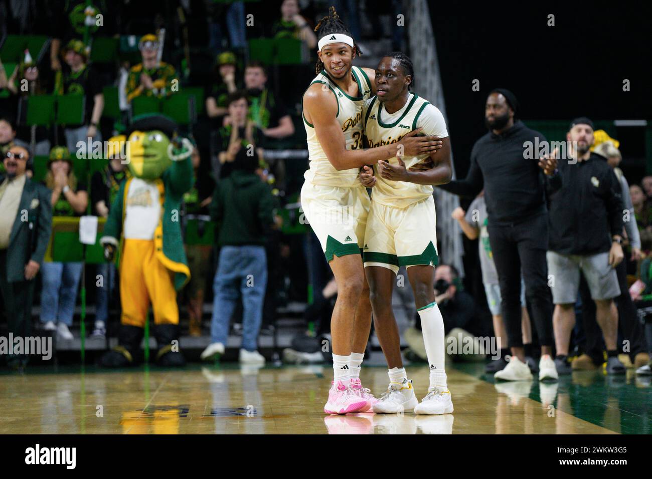 George Mason forward Malik Henry (35) embraces guard Baraka Okojie (3 ...