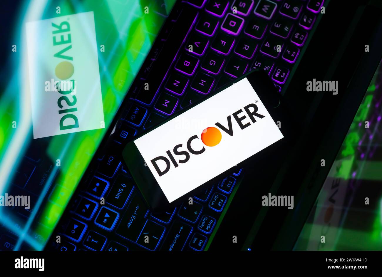 In this photo illustration, the Discover logo is seen displayed on a ...