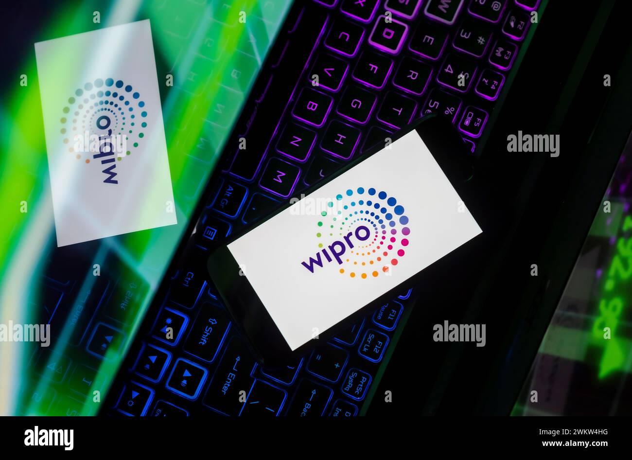In this photo illustration, the Wipro logo is seen displayed on a ...
