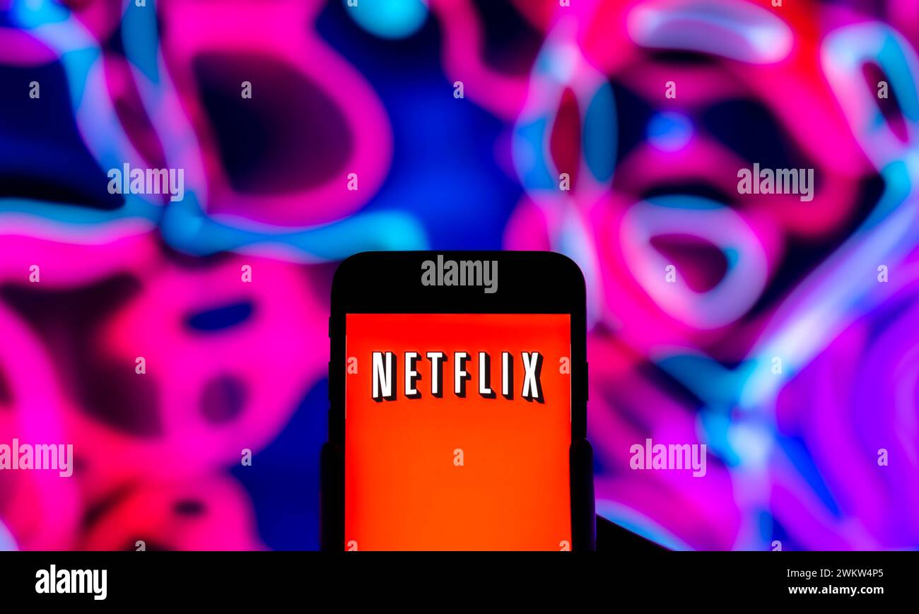 In this photo illustration, the Netflix logo is seen displayed on a ...