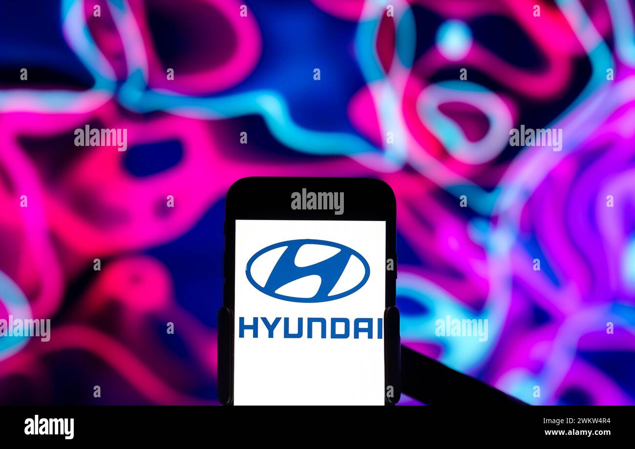 In this photo illustration, the Hyundai logo is seen displayed on a ...