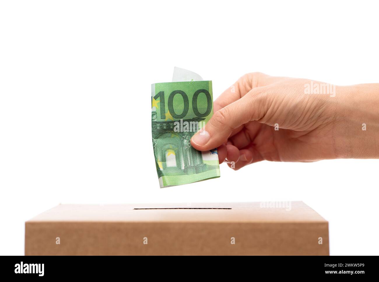 hand putting euro cash money into donation box Stock Photo - Alamy