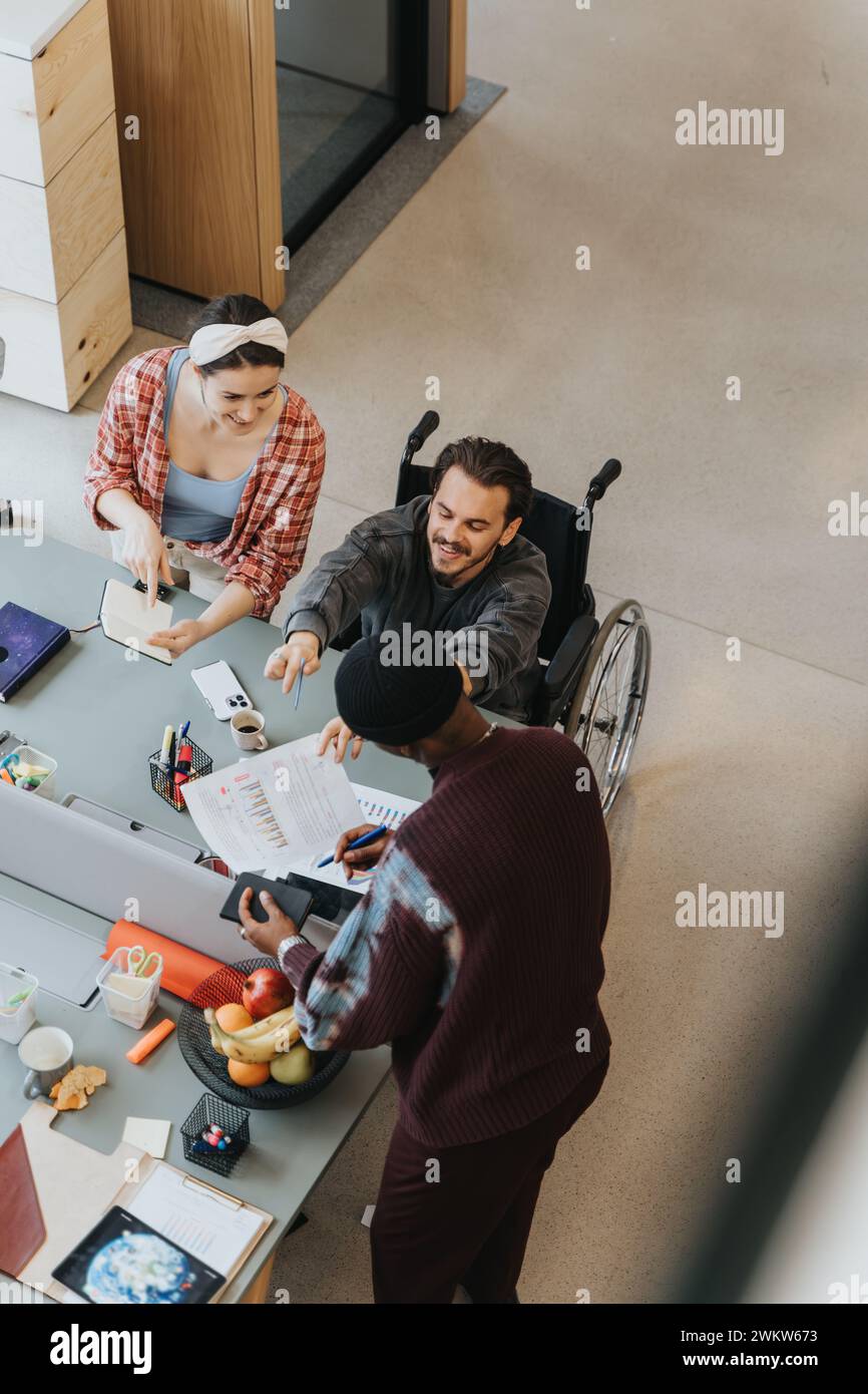 Inclusive work environment concept with diverse team in modern office ...