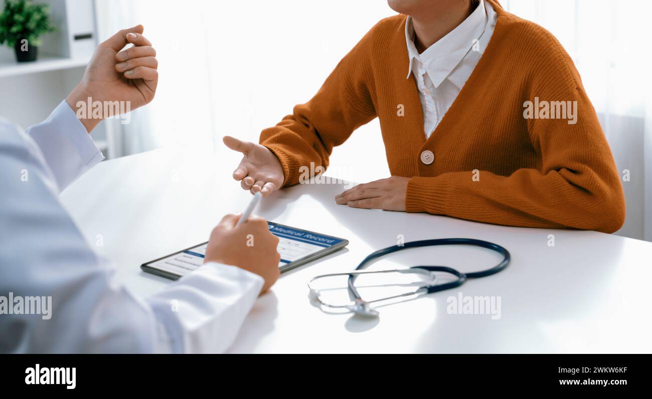 Patient attend doctor's appointment at clinic or hospital office ...