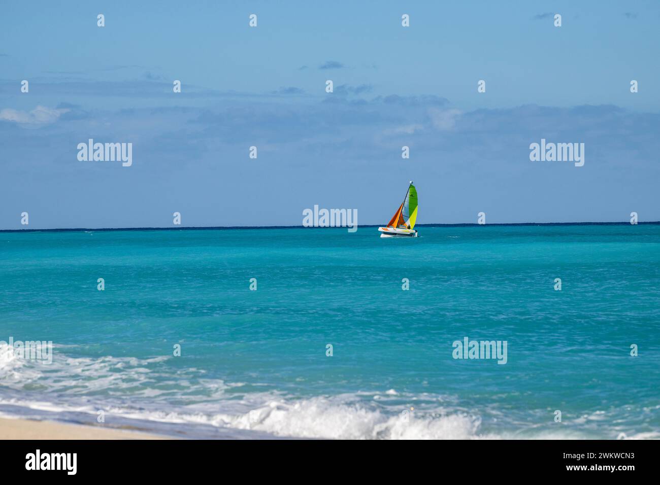 San Salvador Island Bahamas, catamaran sailing the turquoise water ...