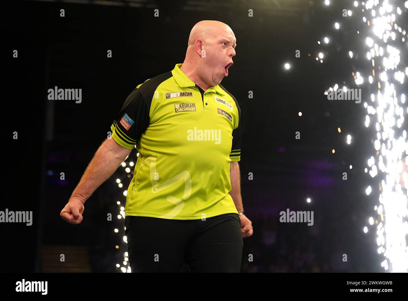 Michael van Gerwen celebrates victory against Luke Littler in the semi ...