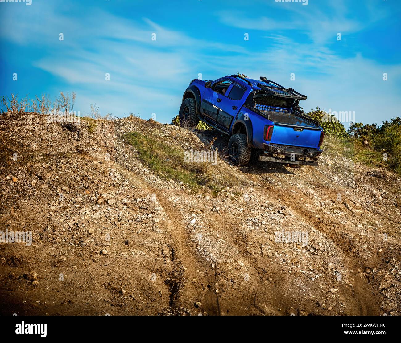 4x4 vehicle climbing a hill. 4x4 truck adventure Stock Photo - Alamy