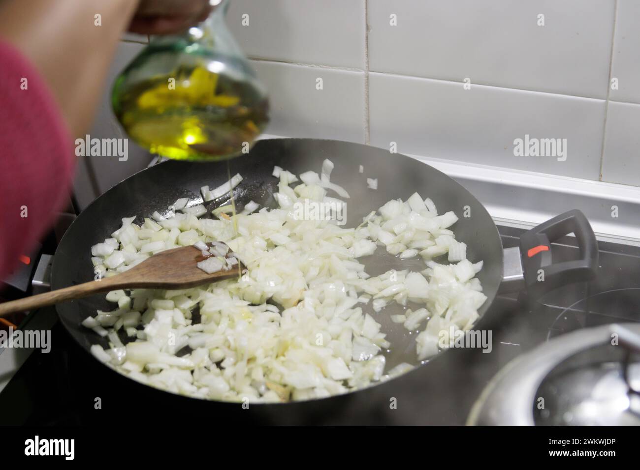Fish in sauce with shrimp. Step by step preparation. Sautéing the ...