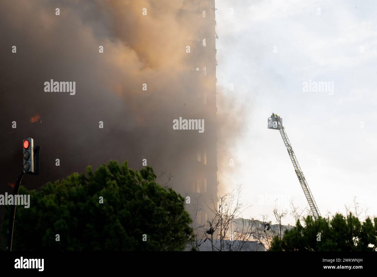 Valencia, Spain - February 22, 2024: Firefighters try to access the ...
