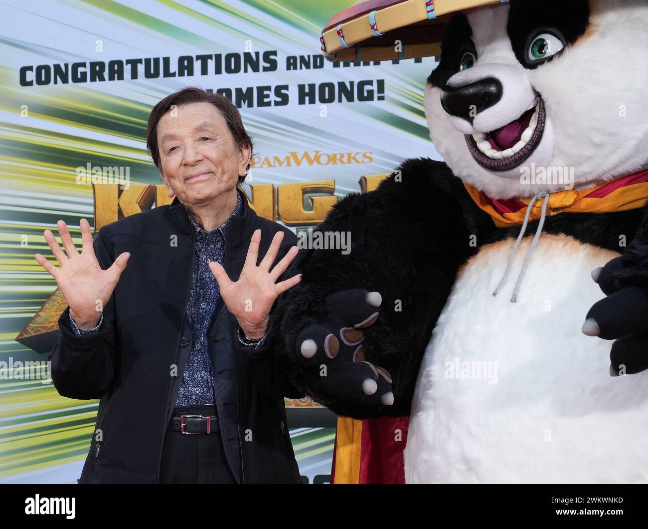 (L-R) James Hong and Po at the James Hong Hand & Footprint in cement ...