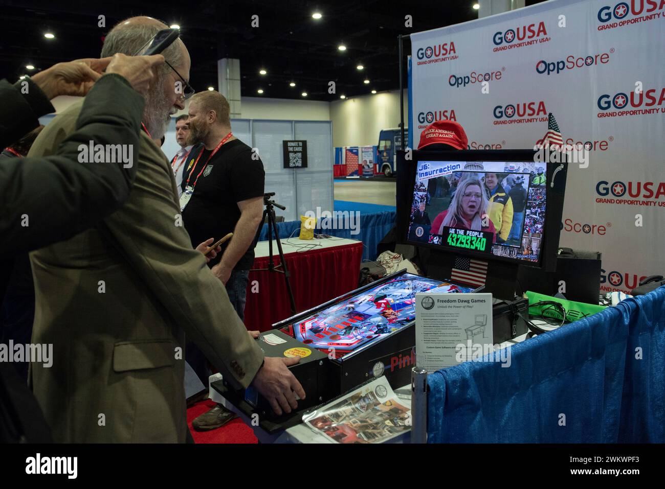 National Harbor, Maryland, USA. 22nd Feb, 2024. A man uses the pinball ...