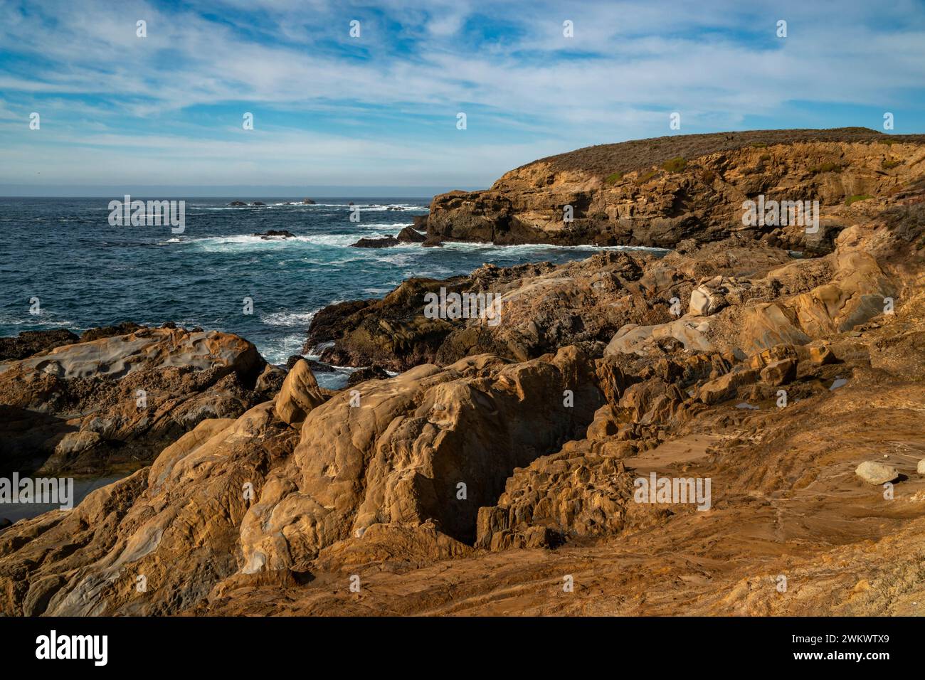 Rugged stone formations line the south cliffside of Point Lobos State ...
