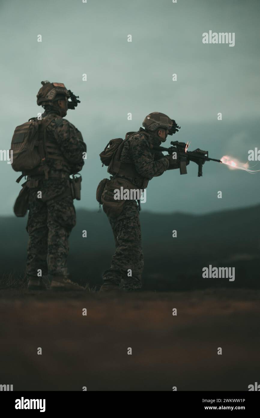 U.S. Marine Corps Lance Cpl. Christian Montemayor, left, a fire support ...