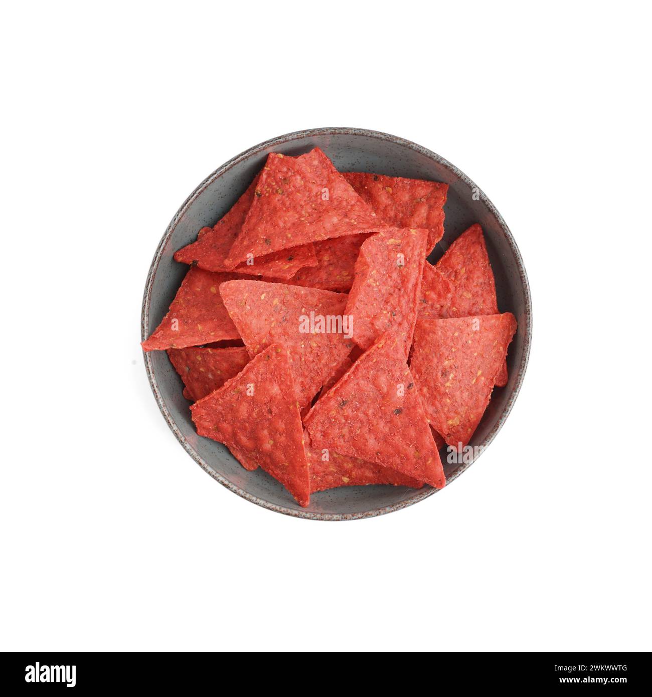 Bowl with tasty red nachos on white background Stock Photo - Alamy