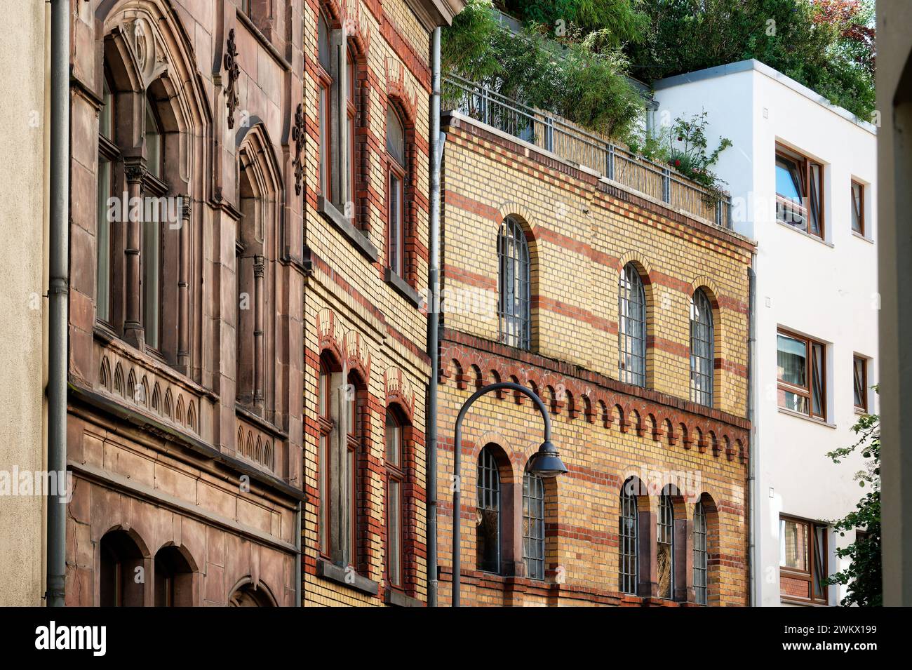 historic buildings next to new buildings in cologne's old town in the ...