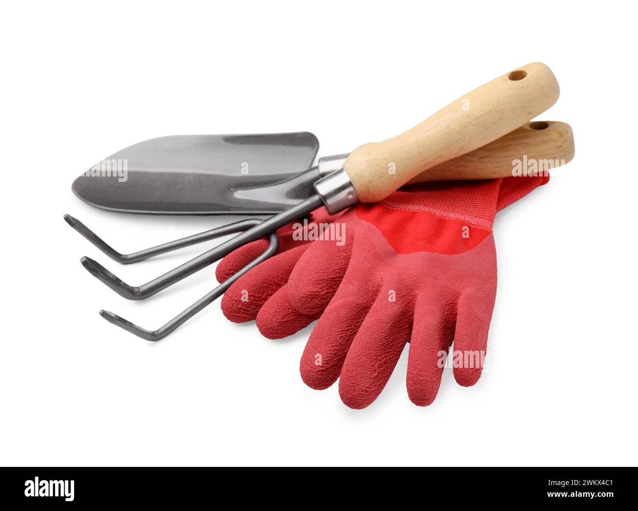 Gardening gloves, trowel and rake isolated on white Stock Photo - Alamy