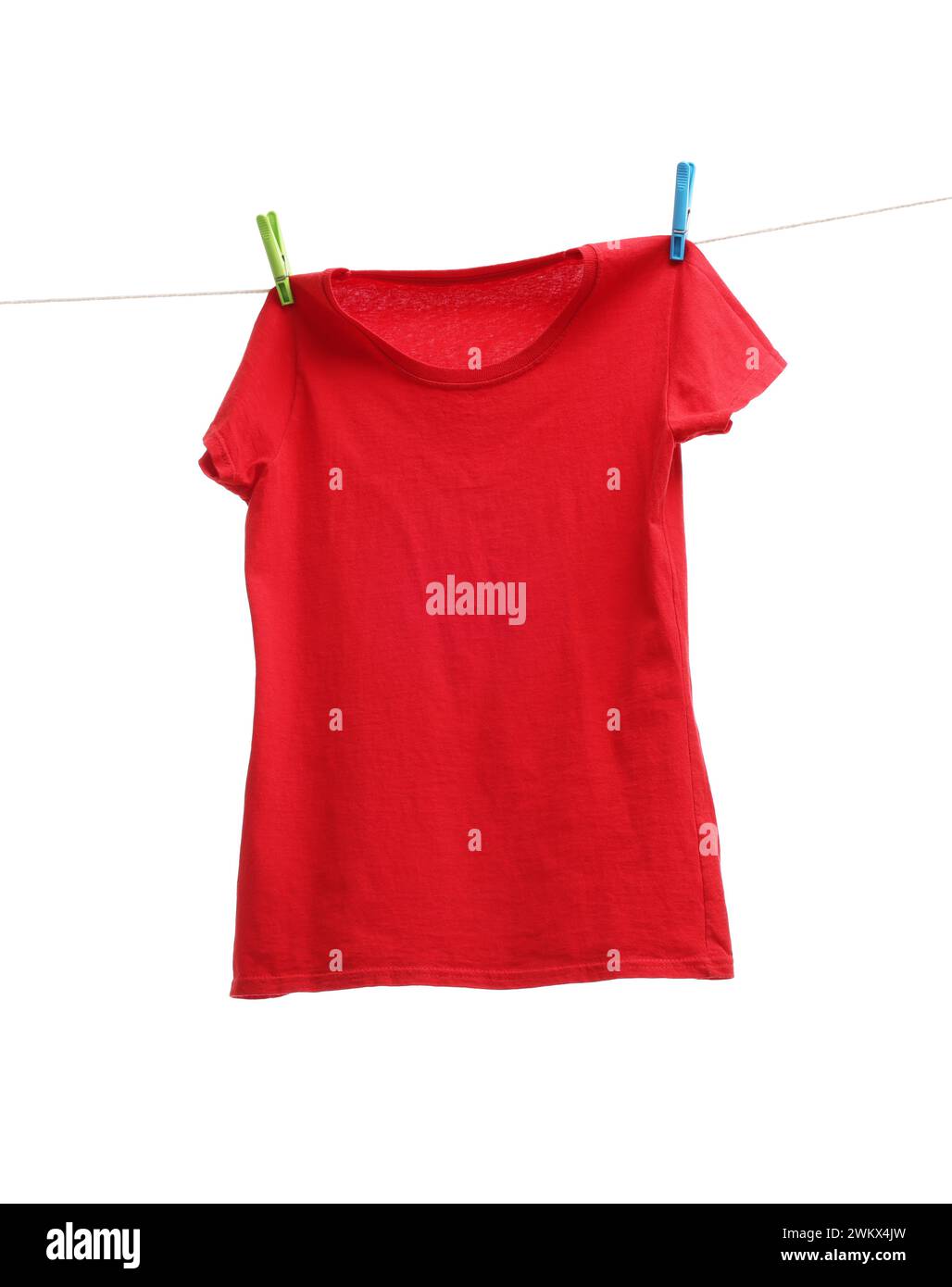 One red t-shirt drying on washing line isolated on white Stock Photo ...