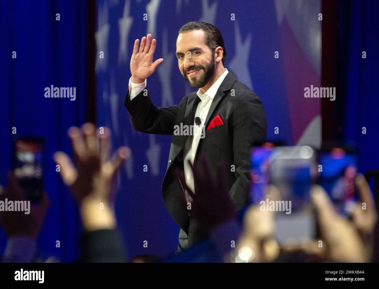 President Nayib Bukele, of El Salvador, waves to the crowd as he ...