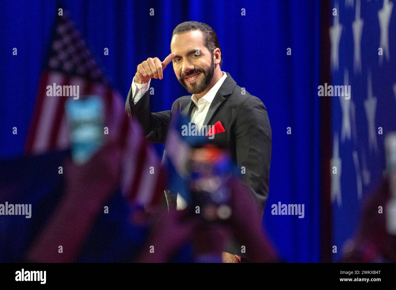 President Nayib Bukele, of El Salvador, gestures to the crowd as he ...