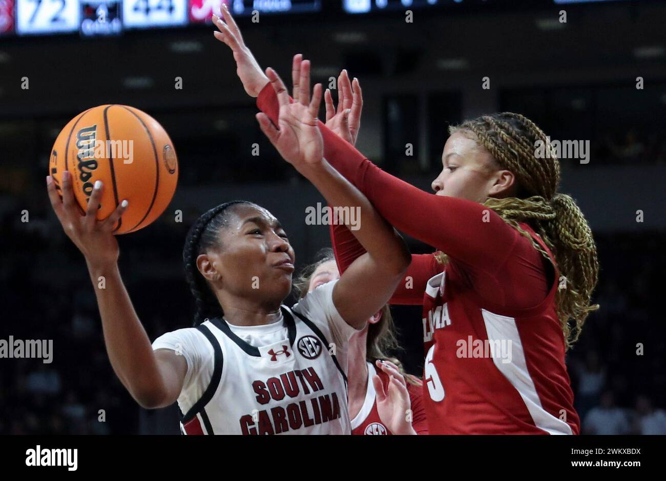 South Carolina guard Bree Hall (23) is defended by Alabama guard ...