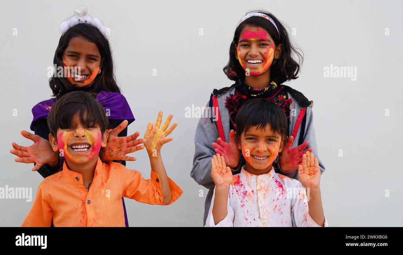 Happy Cute Smiling little Indian kids showing their colourful hands or ...