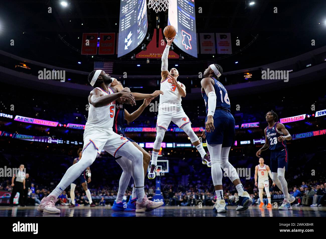 New York Knicks' Josh Hart, center, goes up for a shot during the ...