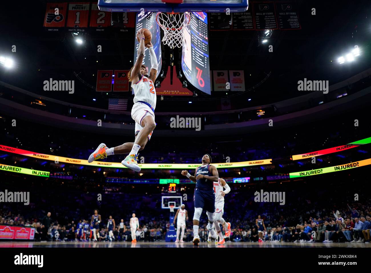 New York Knicks' Miles McBride goes up for a dunk during the second ...