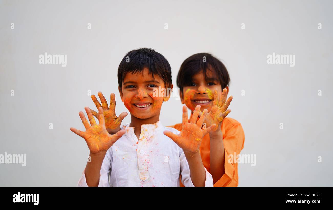 Happy Cute Smiling little Indian kids showing their colourful hands or ...