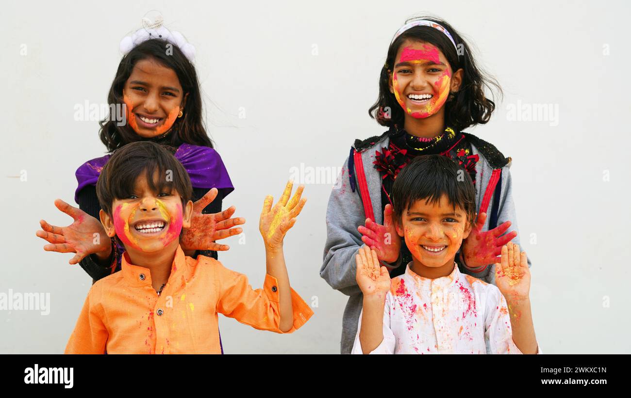 Happy Cute Smiling little Indian kids showing their colourful hands or ...