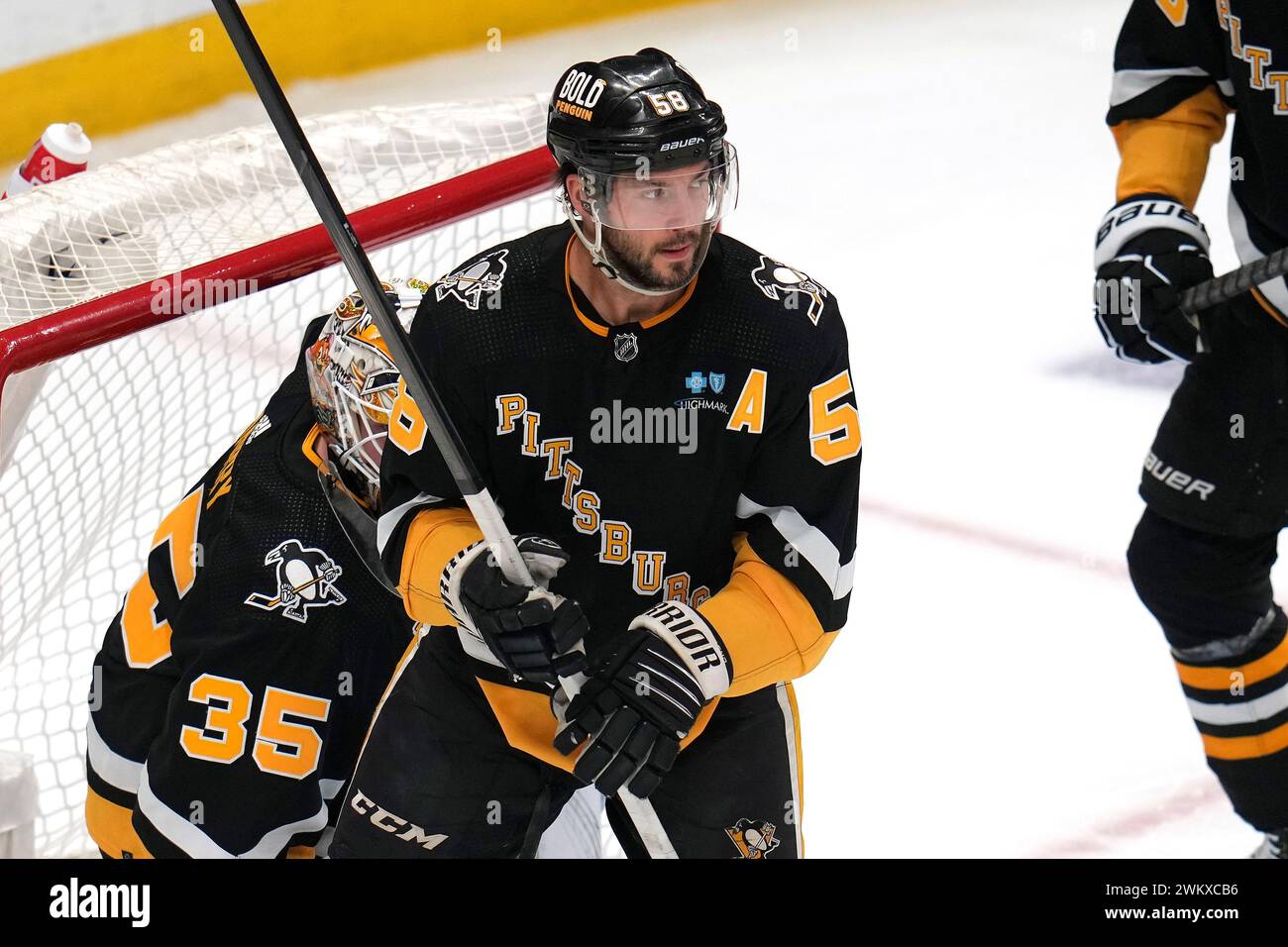Pittsburgh Penguins' Kris Letang (58) defends the goal crease in front ...