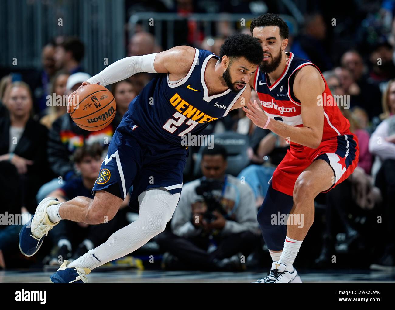 Denver Nuggets guard Jamal Murray, left, drives past Washington Wizards ...