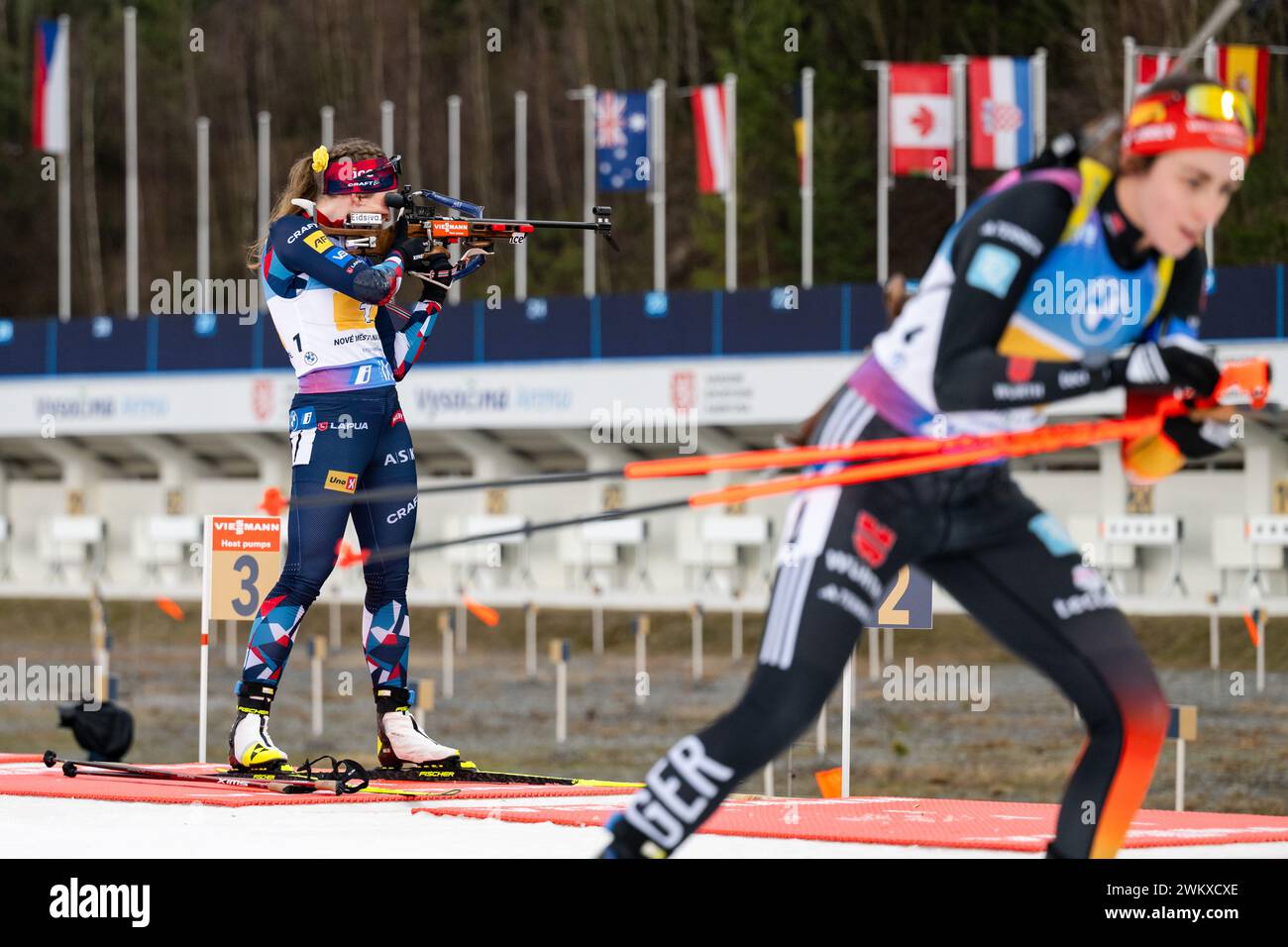 Ida Lien of, Norway. , . and Vanessa Voigt of Germany compete in women ...