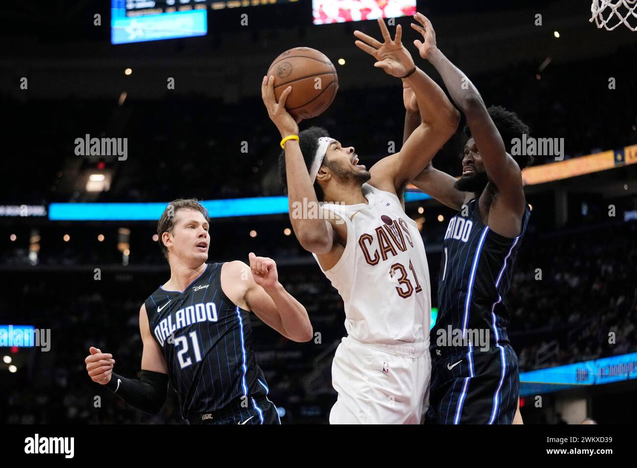 Cleveland Cavaliers center Jarrett Allen (31) shoots between Orlando ...