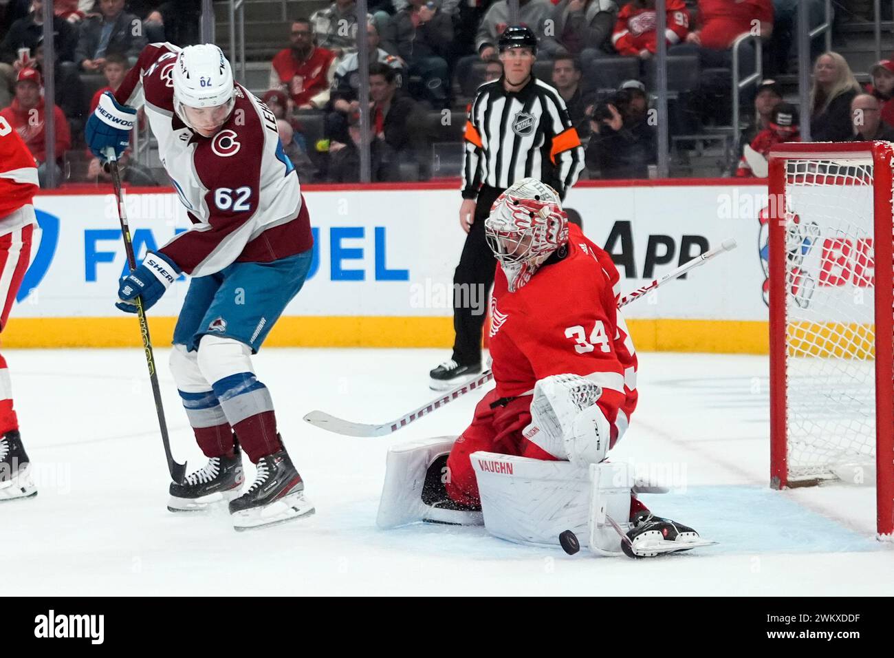 Detroit Red Wings goaltender Alex Lyon (34) stops a puck deflected by ...