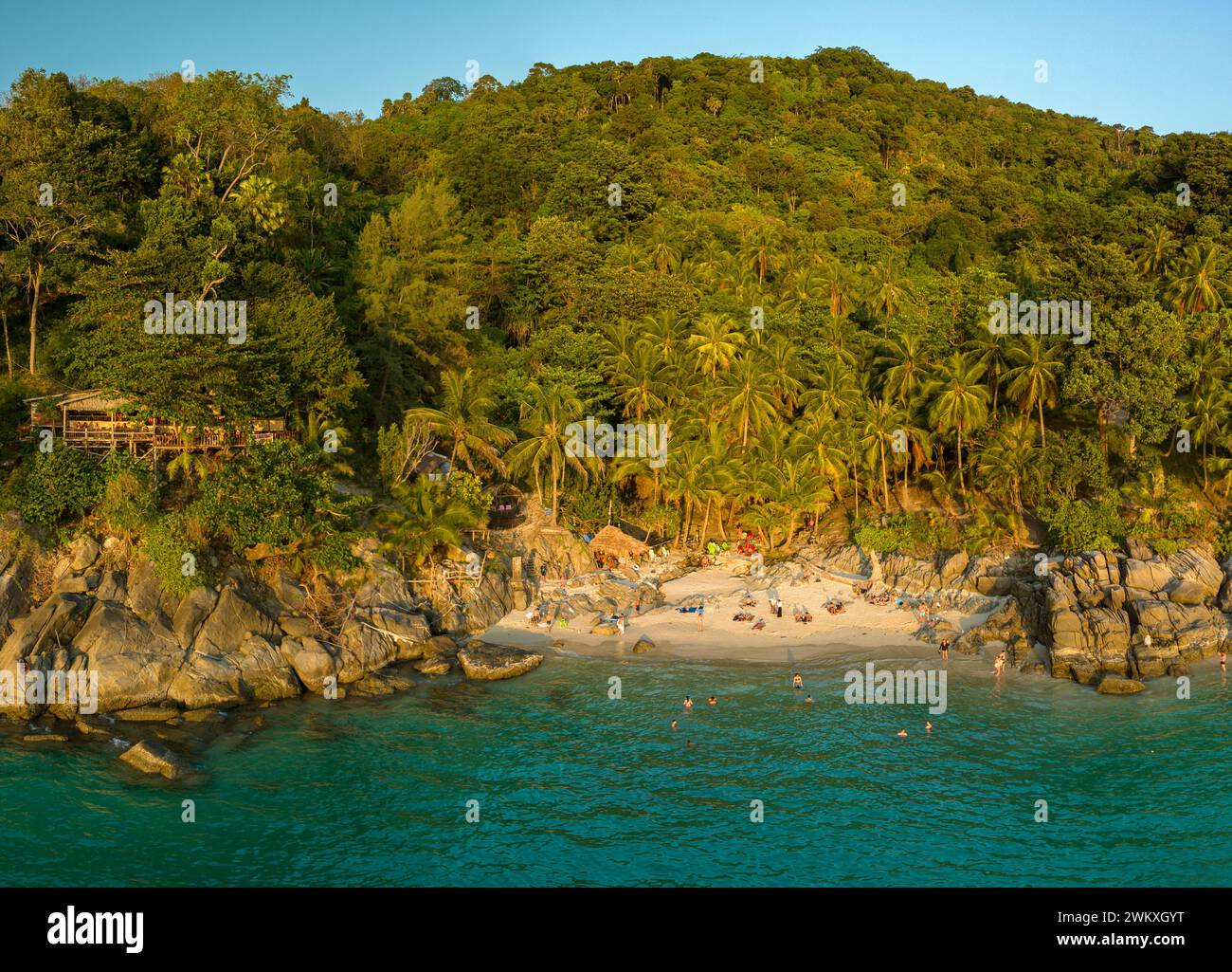 Freedom Beach has a small beach separated by large rocks at the end of ...