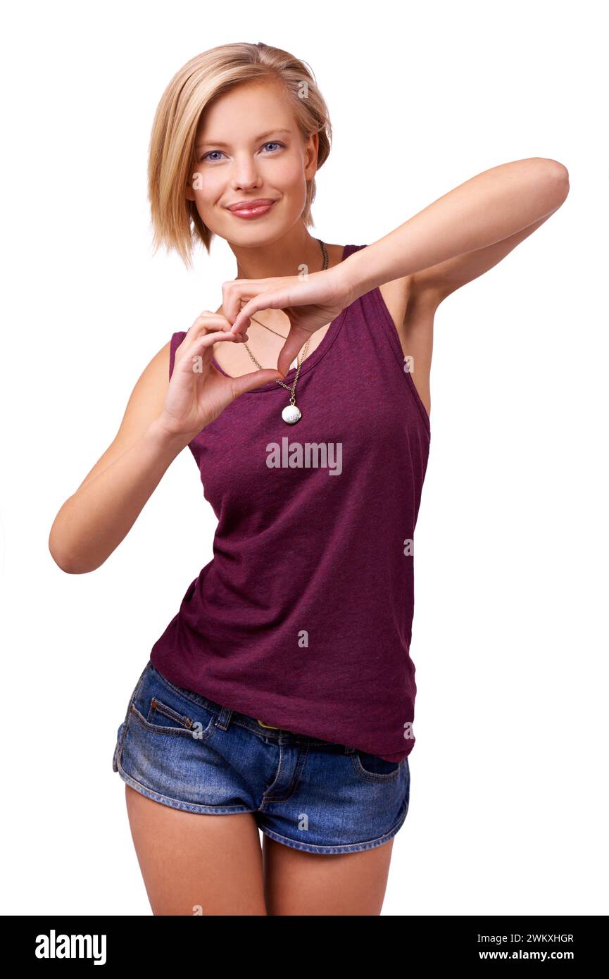 Portrait, gen z woman person and heart hands, smile and isolated on ...