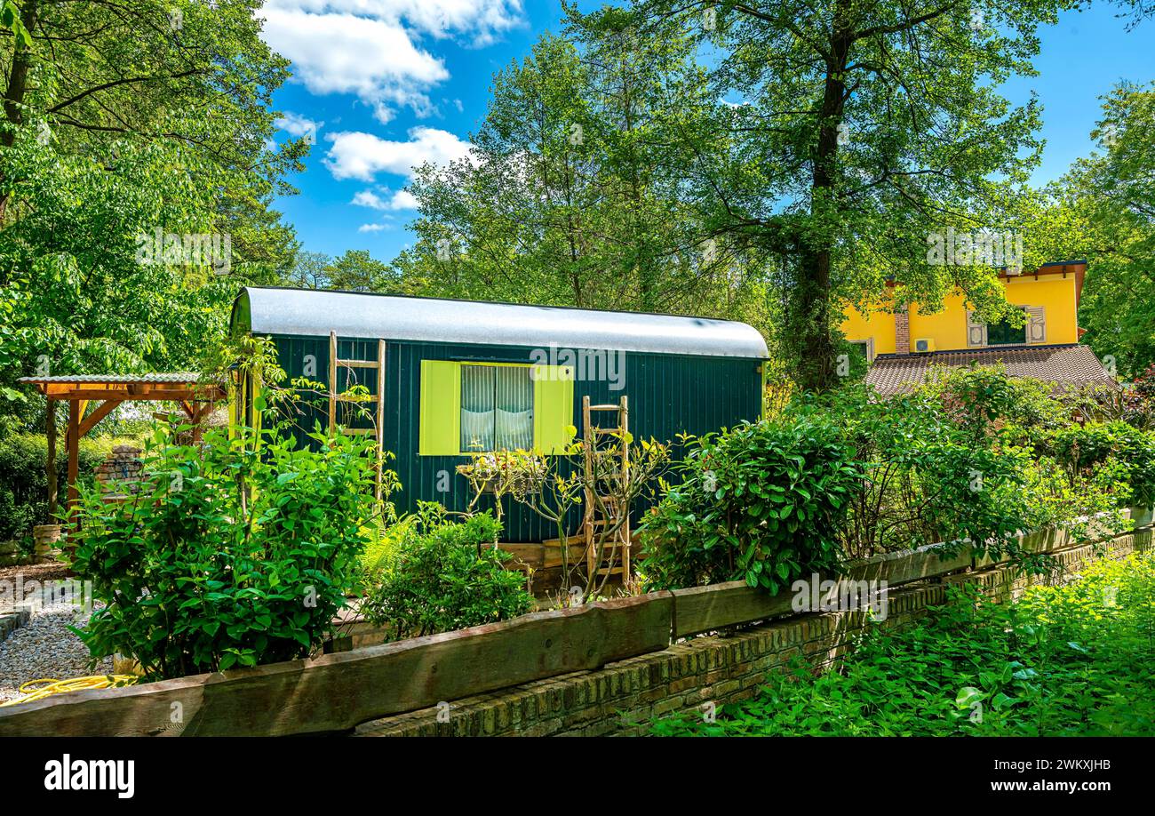Old wooden wagon in a garden, Berlin, Germany Stock Photo - Alamy