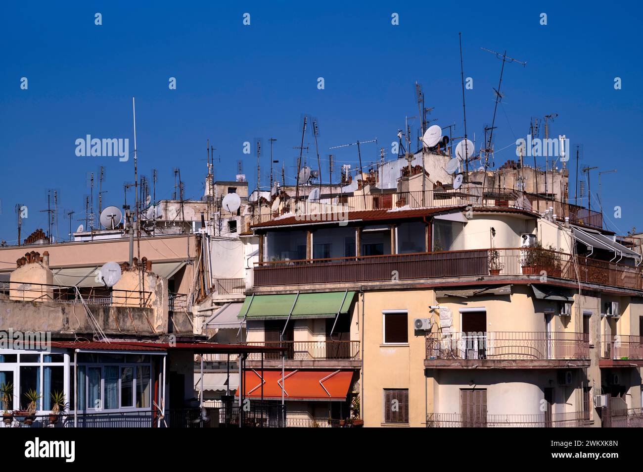Residential buildings, antenna forest, roofs, roof terraces, roof antennas, Leonida Iasonidou ...