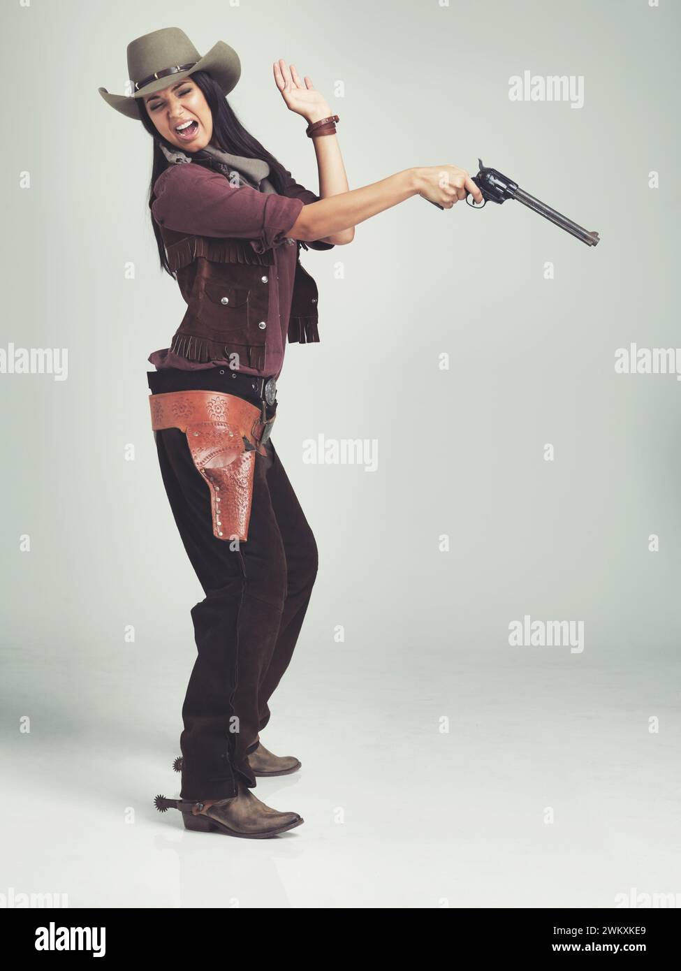 Cowgirl with gun hi-res stock photography and images - Alamy
