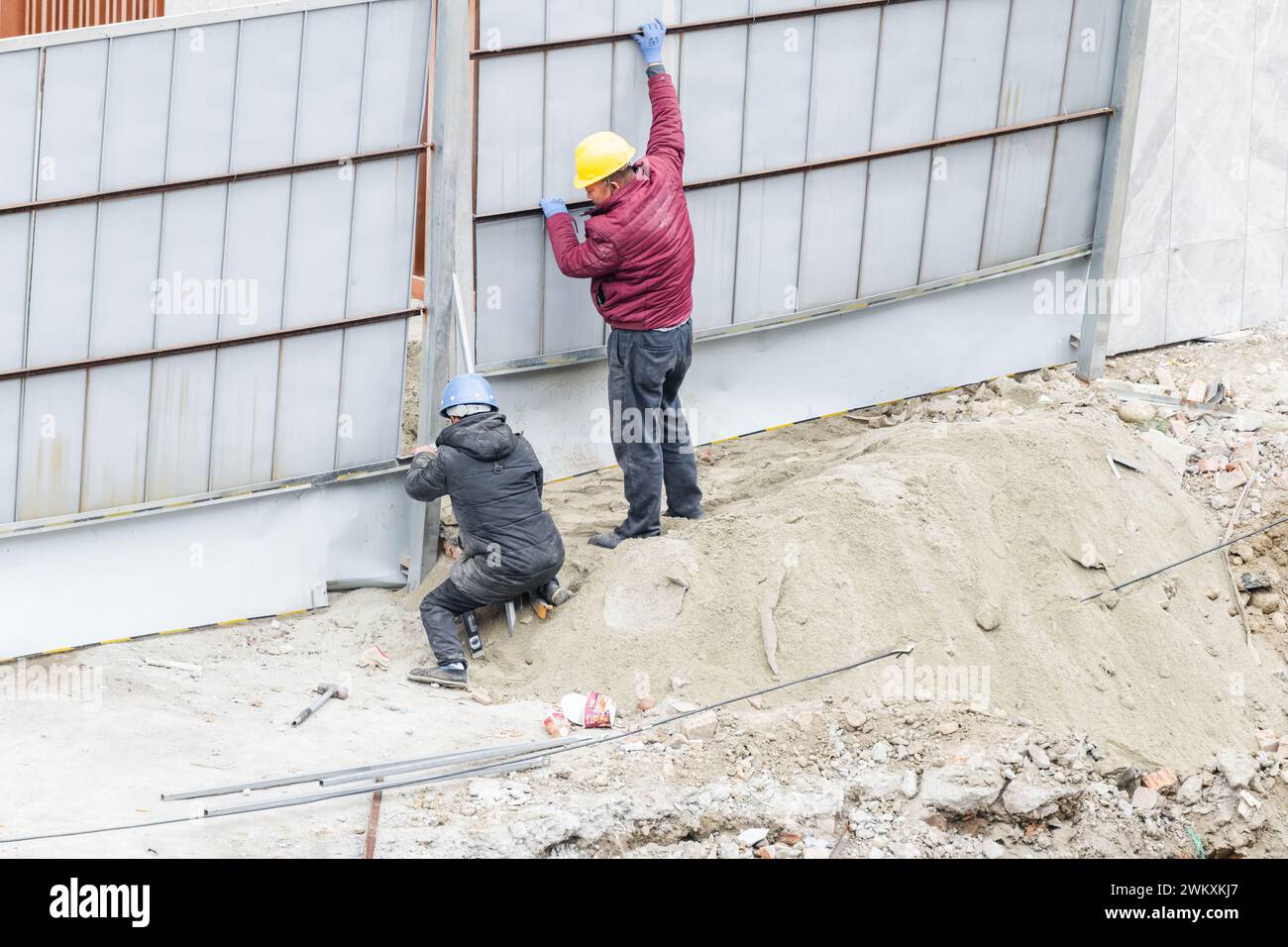 workers working at construction site Stock Photo - Alamy