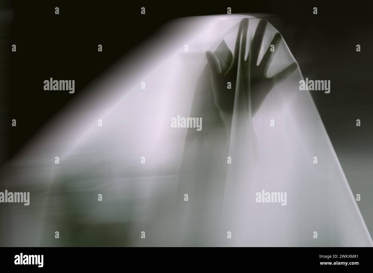 Ghost, apparition and hand for scary horror or late night in dark with ...