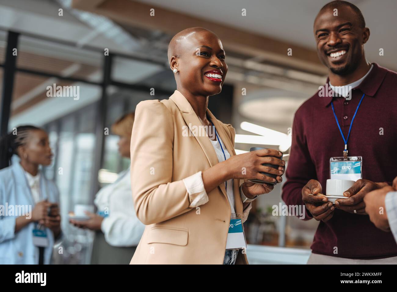 Successful business people networking while enjoying a casual coffee ...