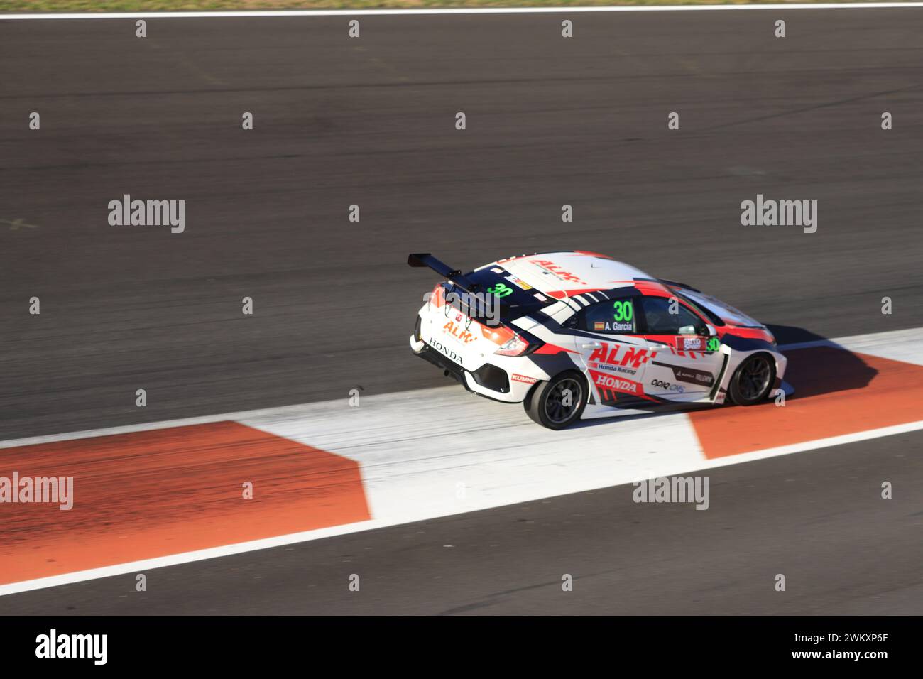A GT3 category competition cars running on the Ricardo Tormo circuit in ...
