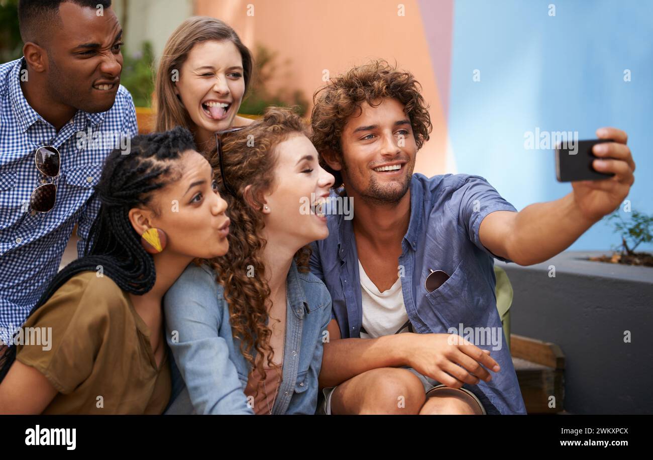 Crazy, face and group of friends for selfie at university campus for ...