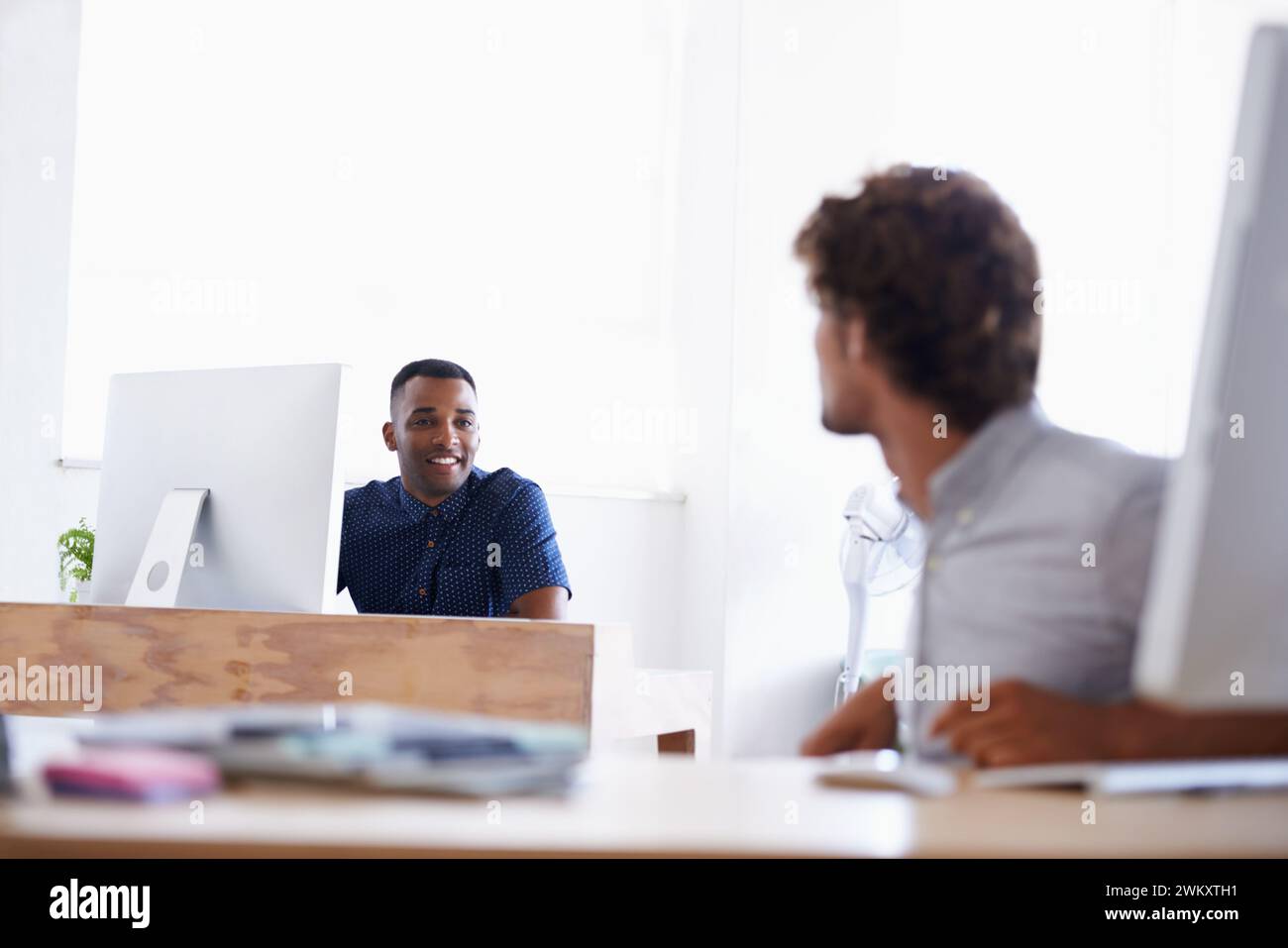 Businessmen, talking and computers in office for planning ...
